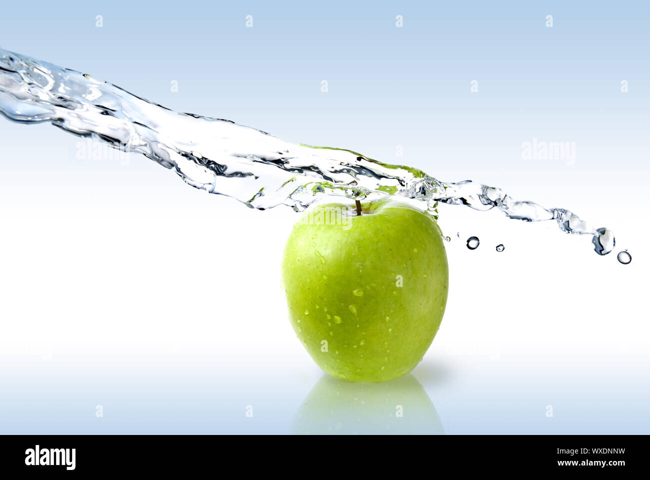 fresh water splash on green apple isolated on white Stock Photo - Alamy