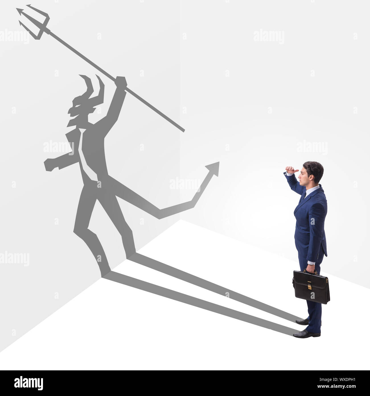 Devil hiding in the businessman - alter ego concept Stock Photo - Alamy