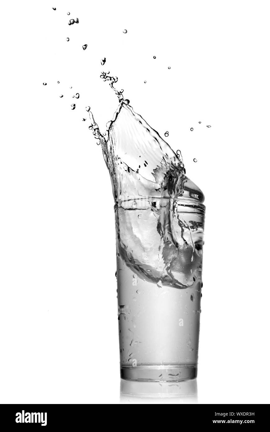 water splash in glass isolated on white Stock Photo - Alamy