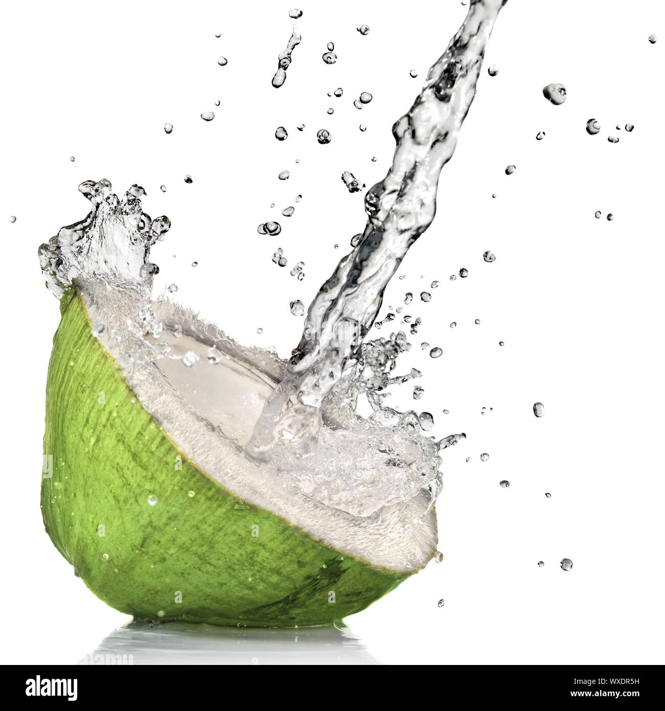 Green coconut water splash isolated hi-res stock photography and images ...