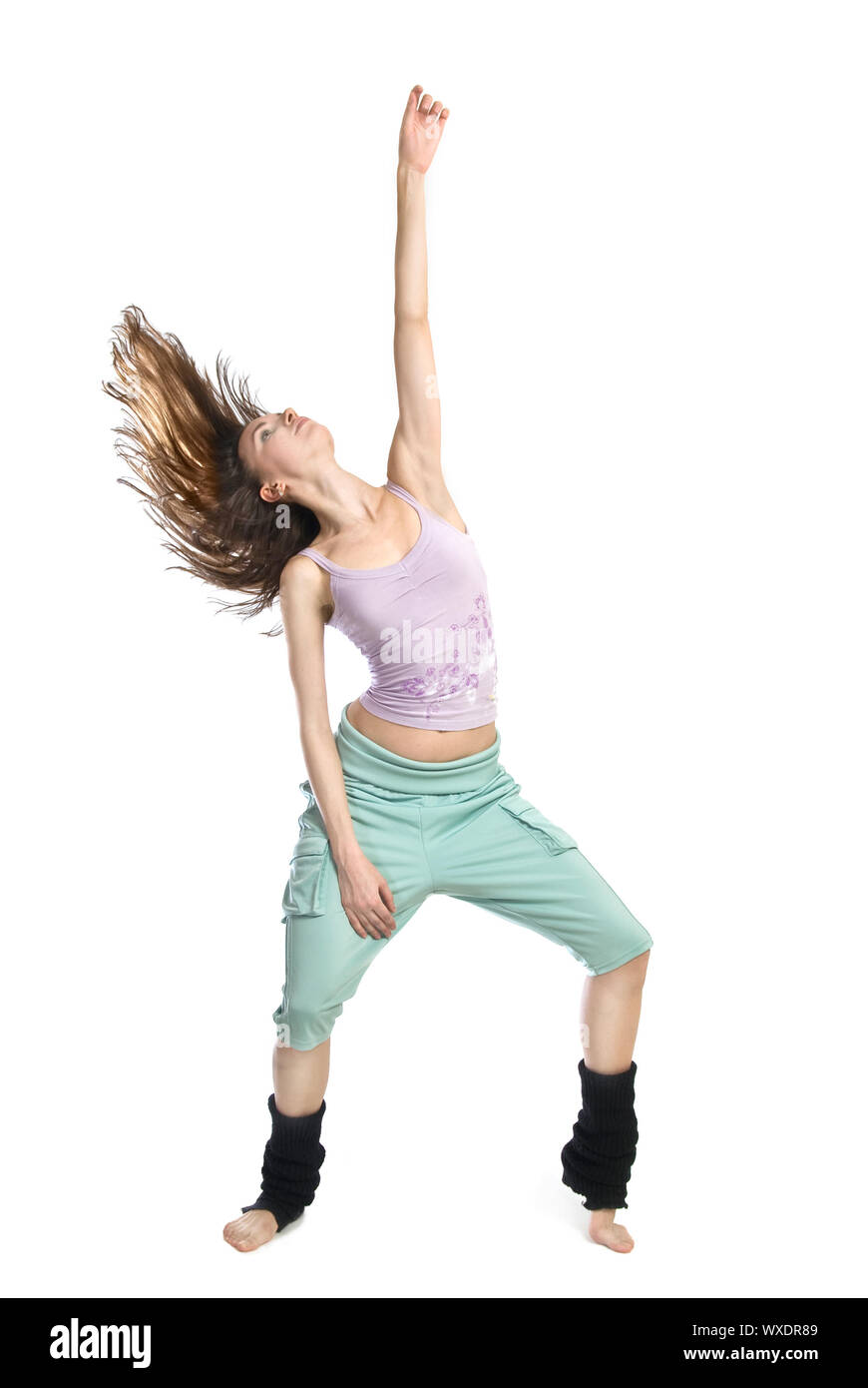 Posing young dancer isolated on white background Stock Photo - Alamy