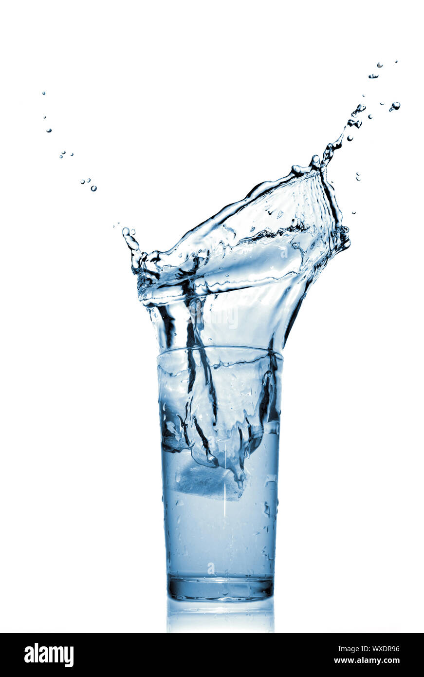water splash in glass isolated on white Stock Photo - Alamy