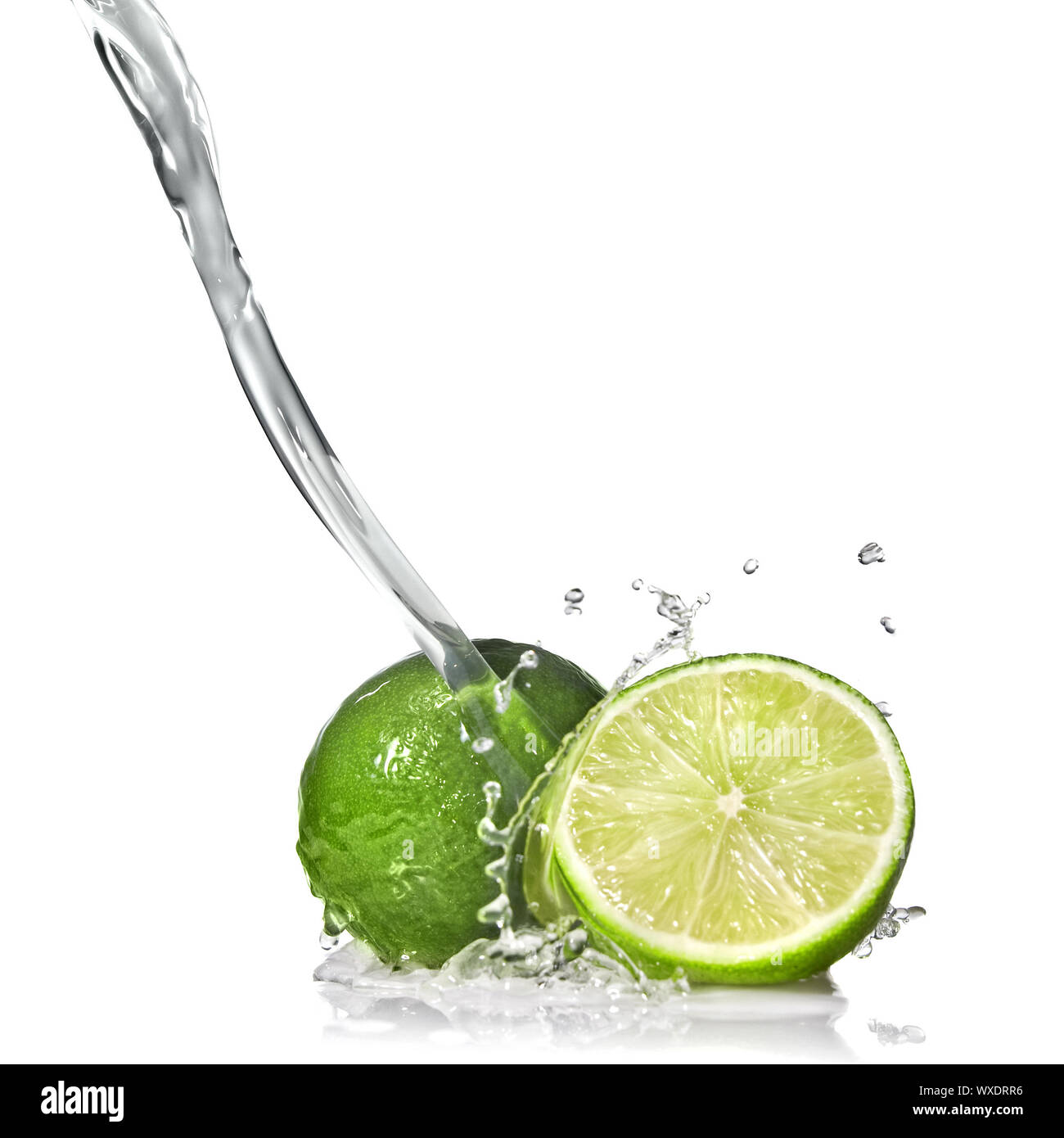 Water splash on lime isolated on white Stock Photo - Alamy