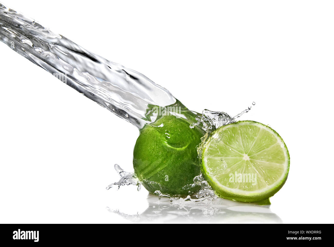 Water splash on lime isolated on white Stock Photo - Alamy