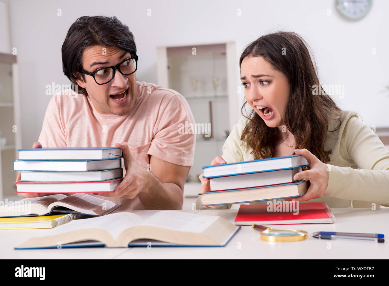 Students preparing for exam together at home Stock Photo - Alamy