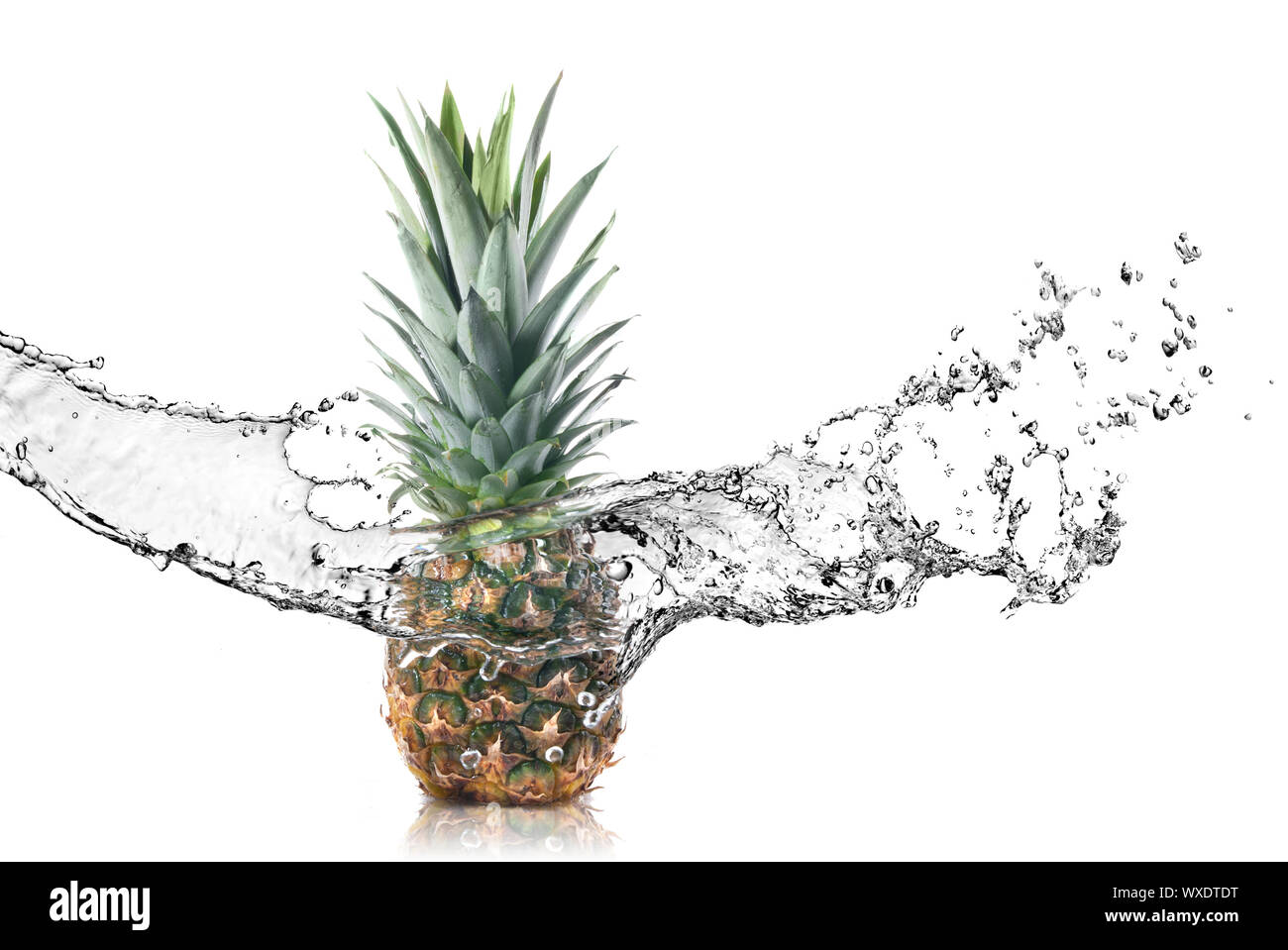 pineapple with water splash isolated on white Stock Photo - Alamy
