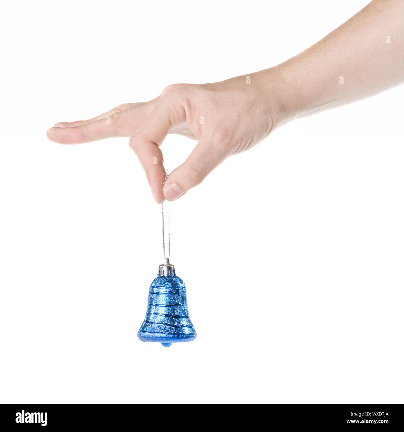 arm holding blue christmas bell isolated on white Stock Photo - Alamy