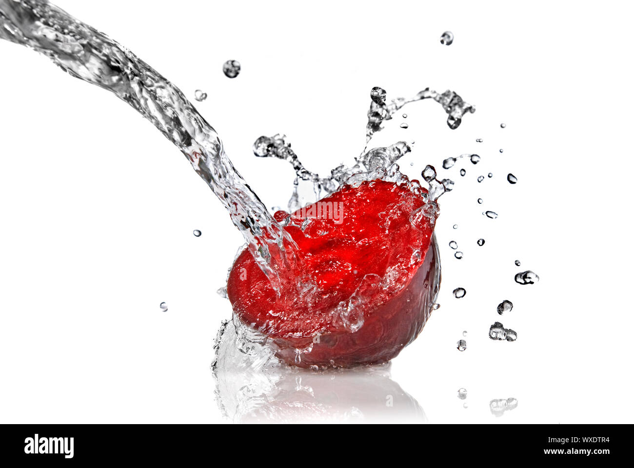 red beet with water splash isolated on white Stock Photo - Alamy