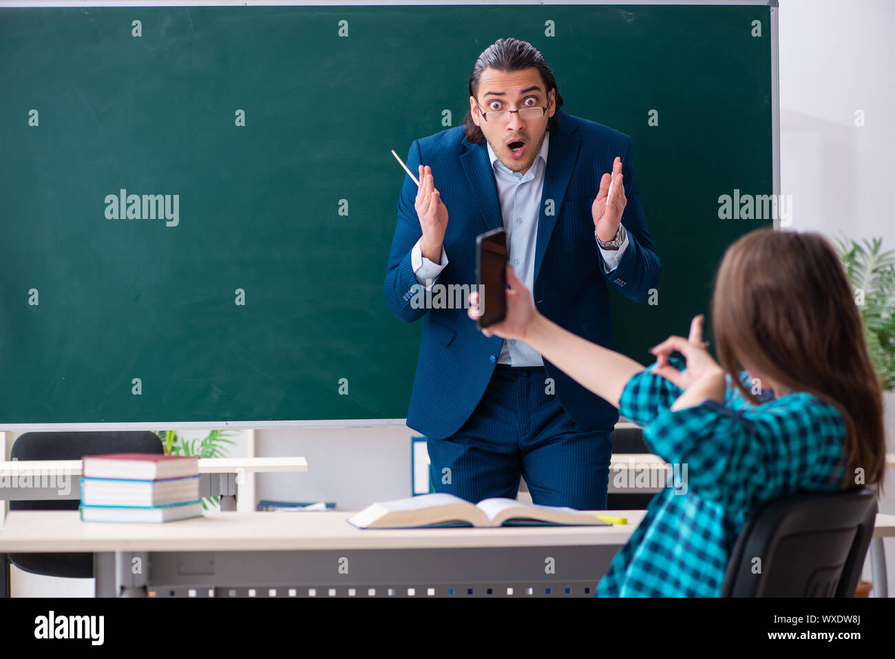 Scared female teacher hi-res stock photography and images - Alamy Scared female teacher hi-res stock photography and images - Alamy