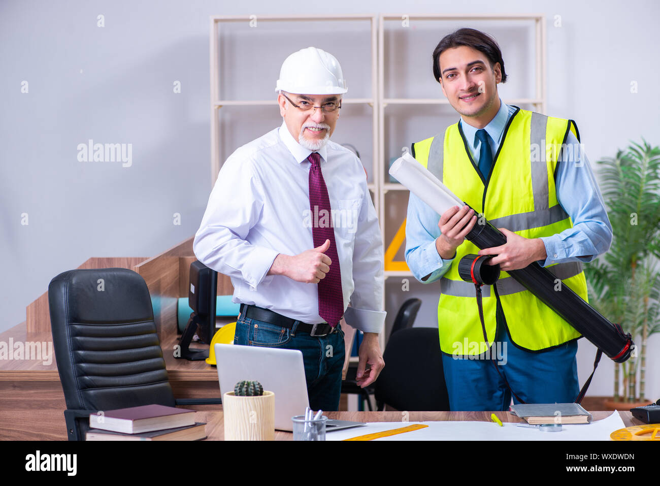 Two architects working on the project Stock Photo - Alamy