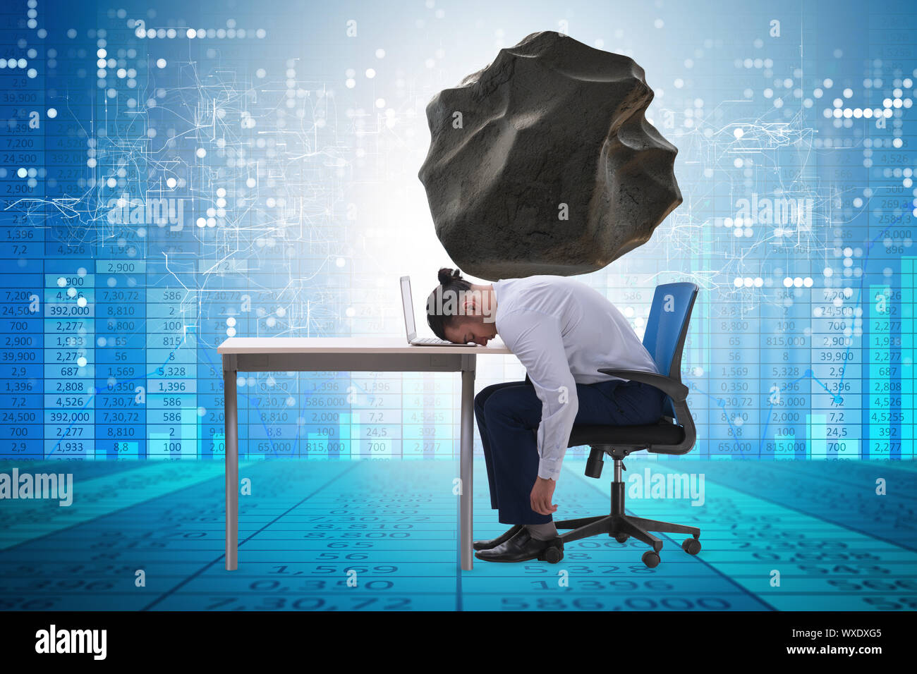 Employee under the burden of work Stock Photo - Alamy