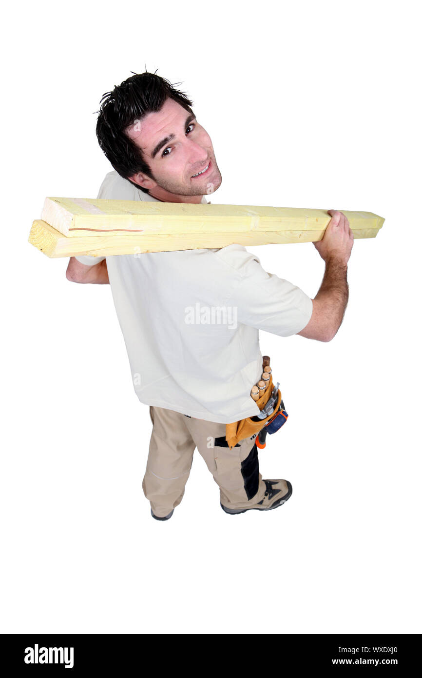 Man carrying construction supplies hi-res stock photography and images ...