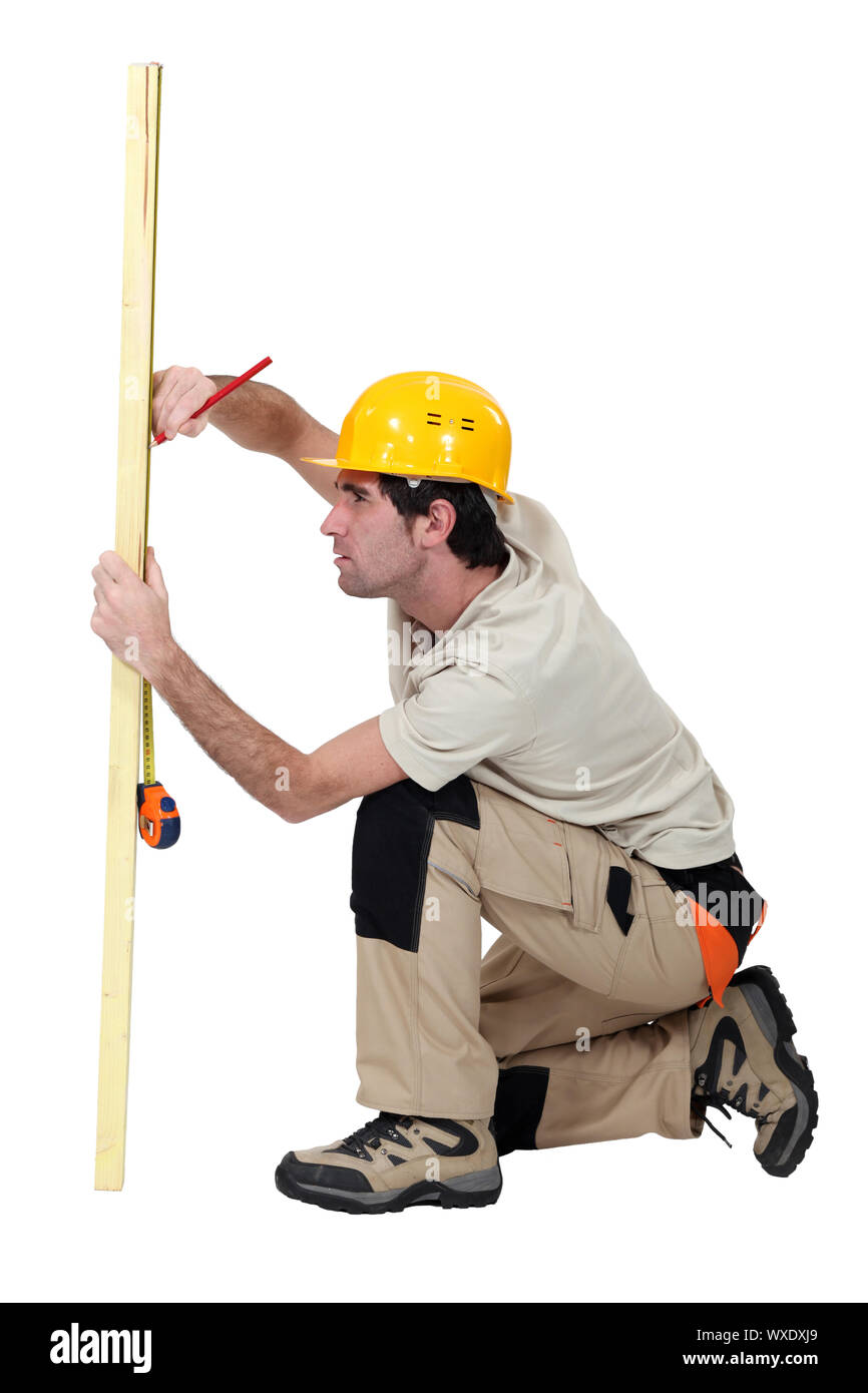 Carpenter measuring bar Stock Photo - Alamy