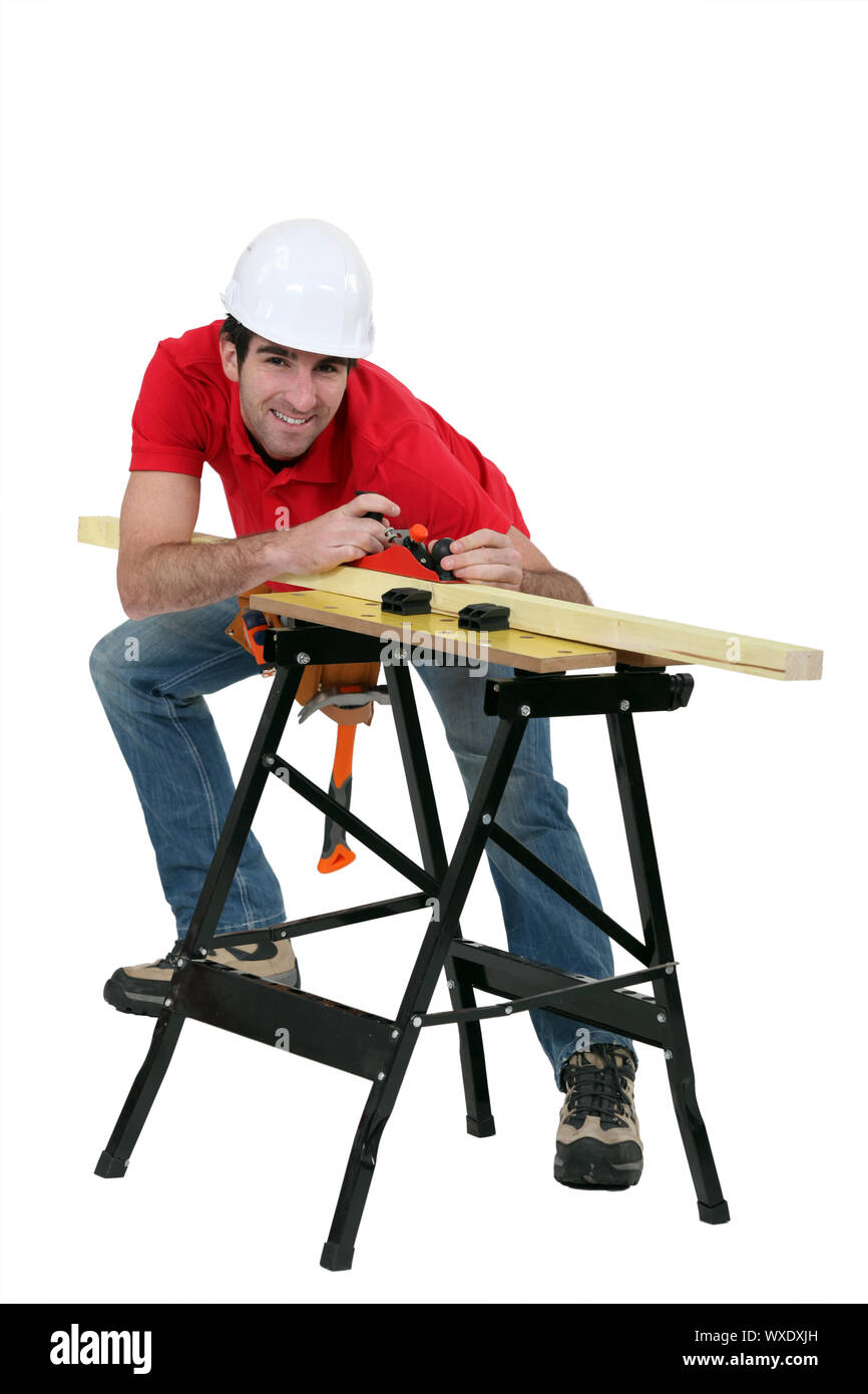 Happy carpenter, studio shot Stock Photo - Alamy