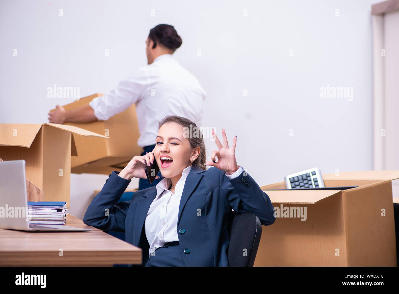 Two employees being fired from their work Stock Photo - Alamy