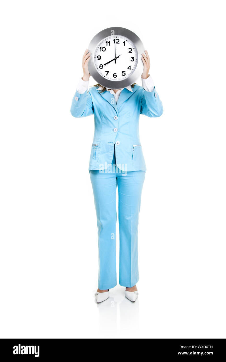Business active woman standing over a white background with a clock on ...