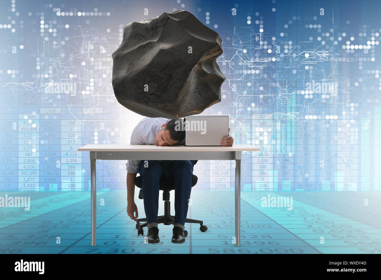 Employee under the burden of work Stock Photo - Alamy