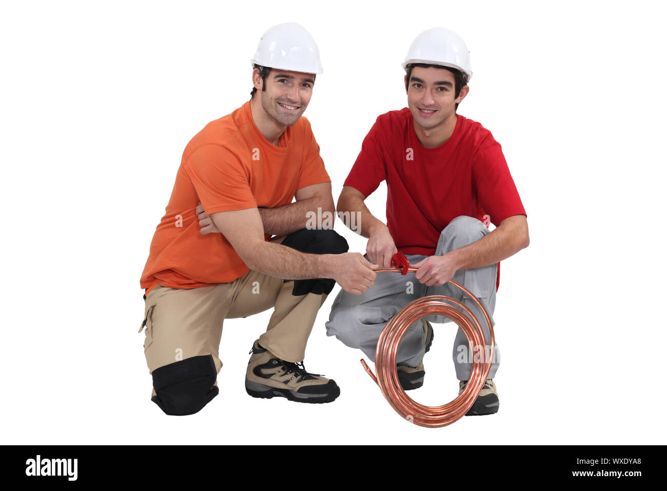 Team of plumbers hi-res stock photography and images - Alamy