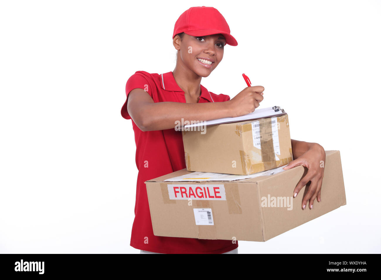 Woman making a delivery Stock Photo - Alamy