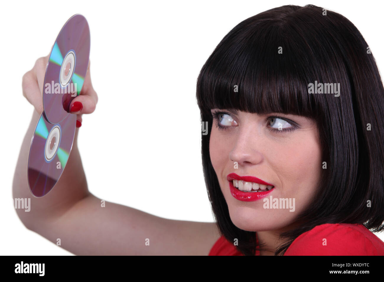 Brunette woman with CD Stock Photo - Alamy