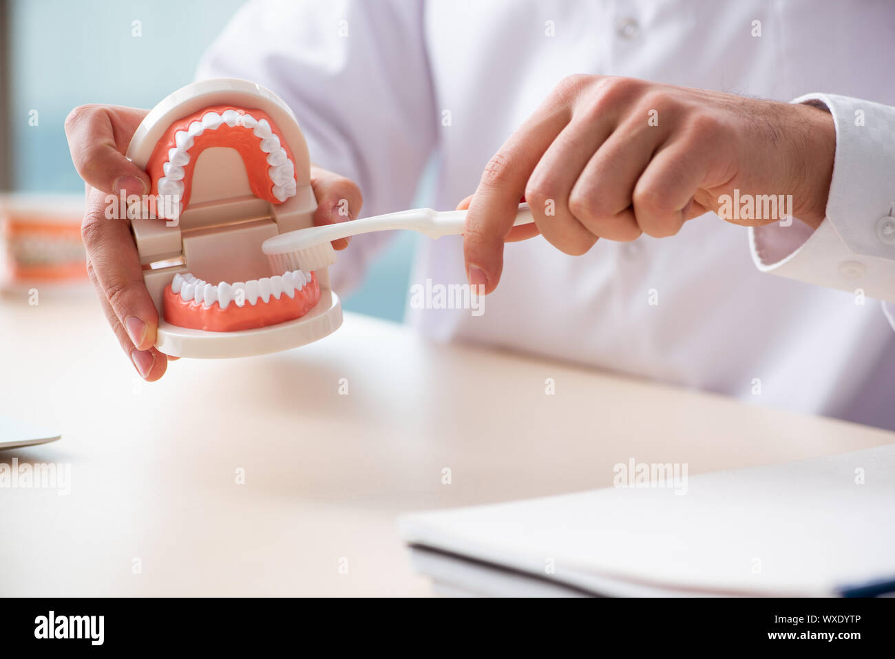 Male doctor stomatologist working in the clinic Stock Photo - Alamy