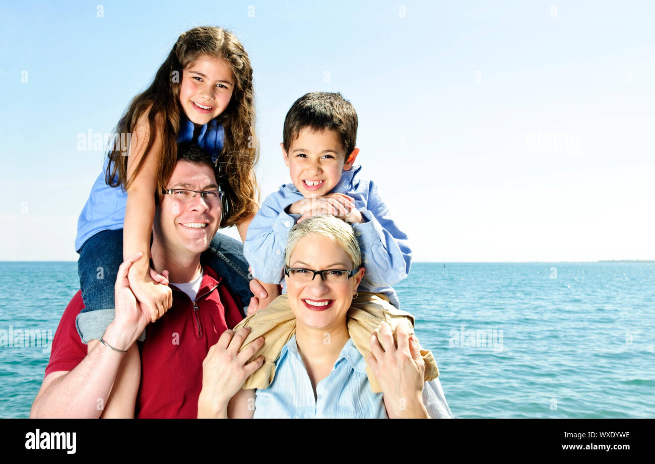 Giving daughter shoulder ride hi-res stock photography and images - Alamy