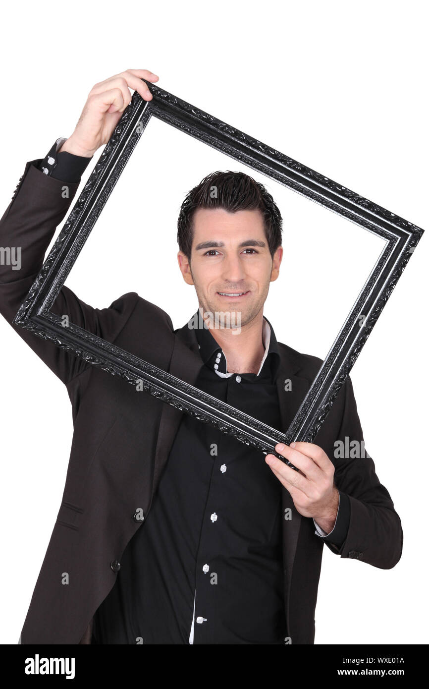 Man with black frame Stock Photo - Alamy
