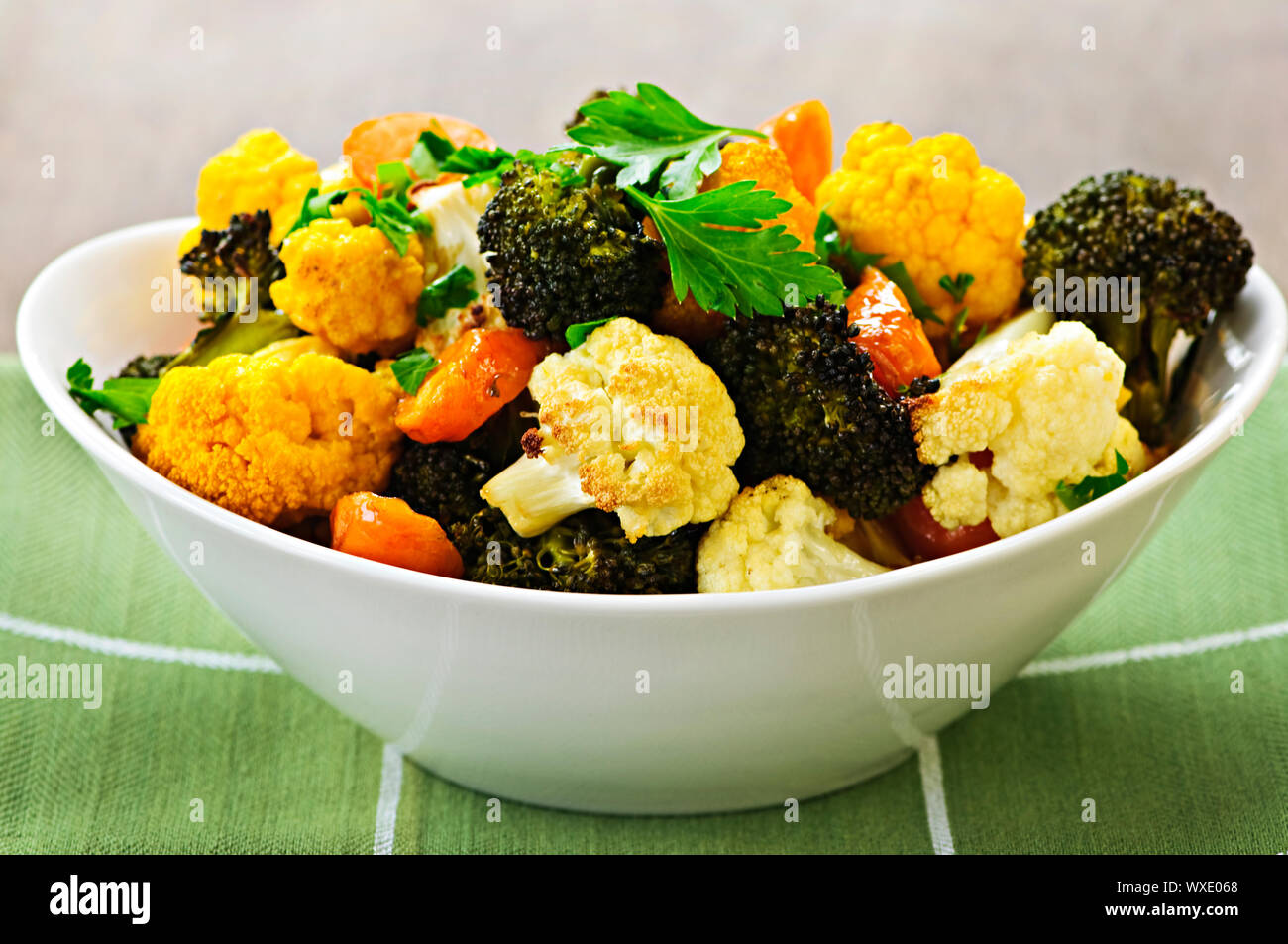 Vegetarian dish of fresh roasted organic vegetables Stock Photo - Alamy