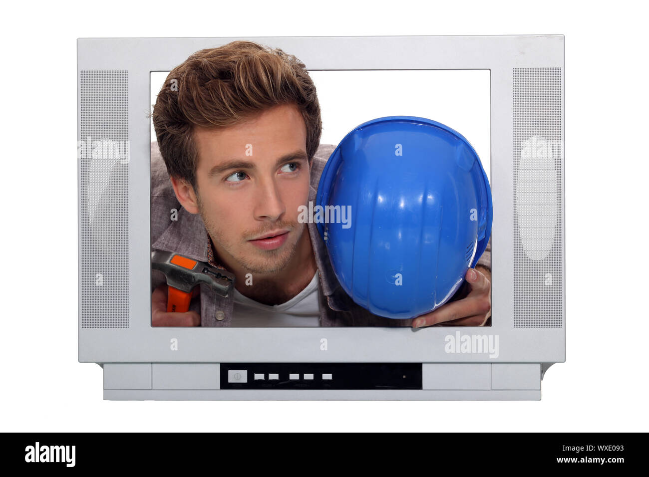 Young man and his hard hat stuck in a television screen Stock Photo - Alamy