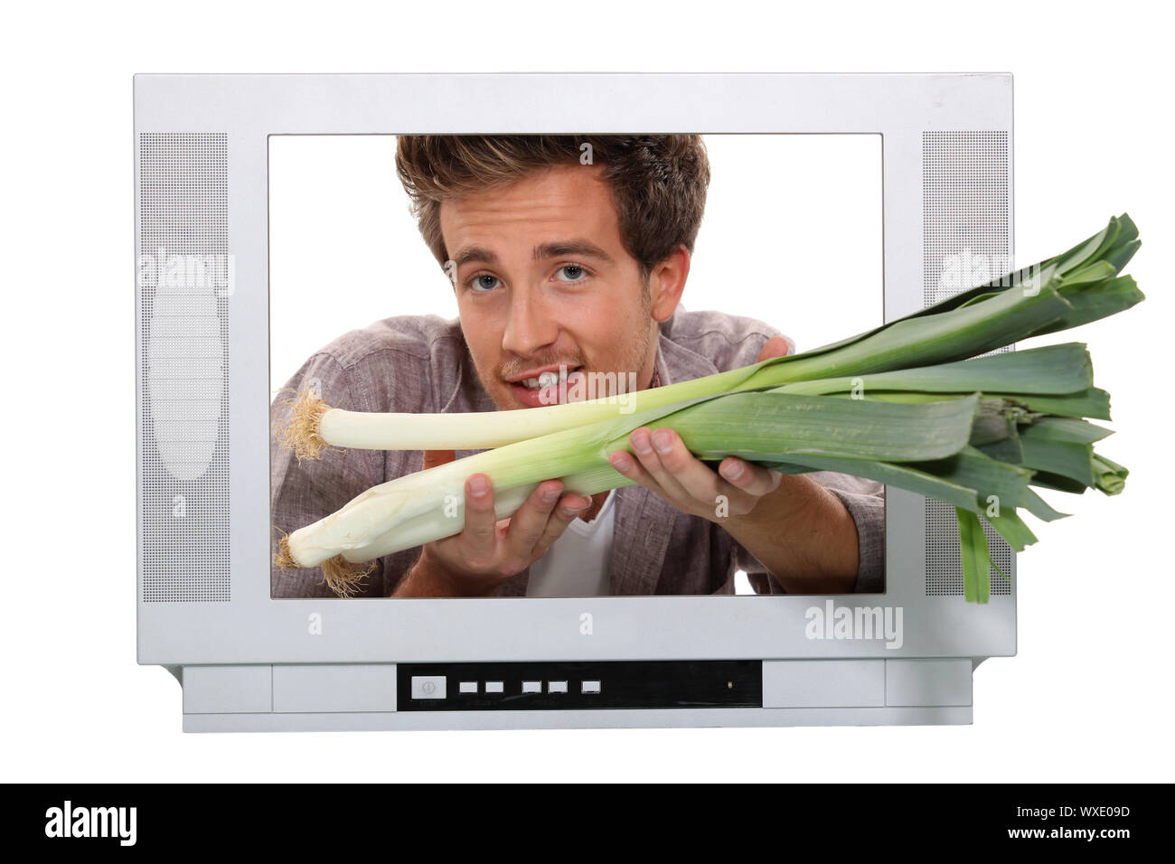 Man handing over bunch of leeks Stock Photo - Alamy