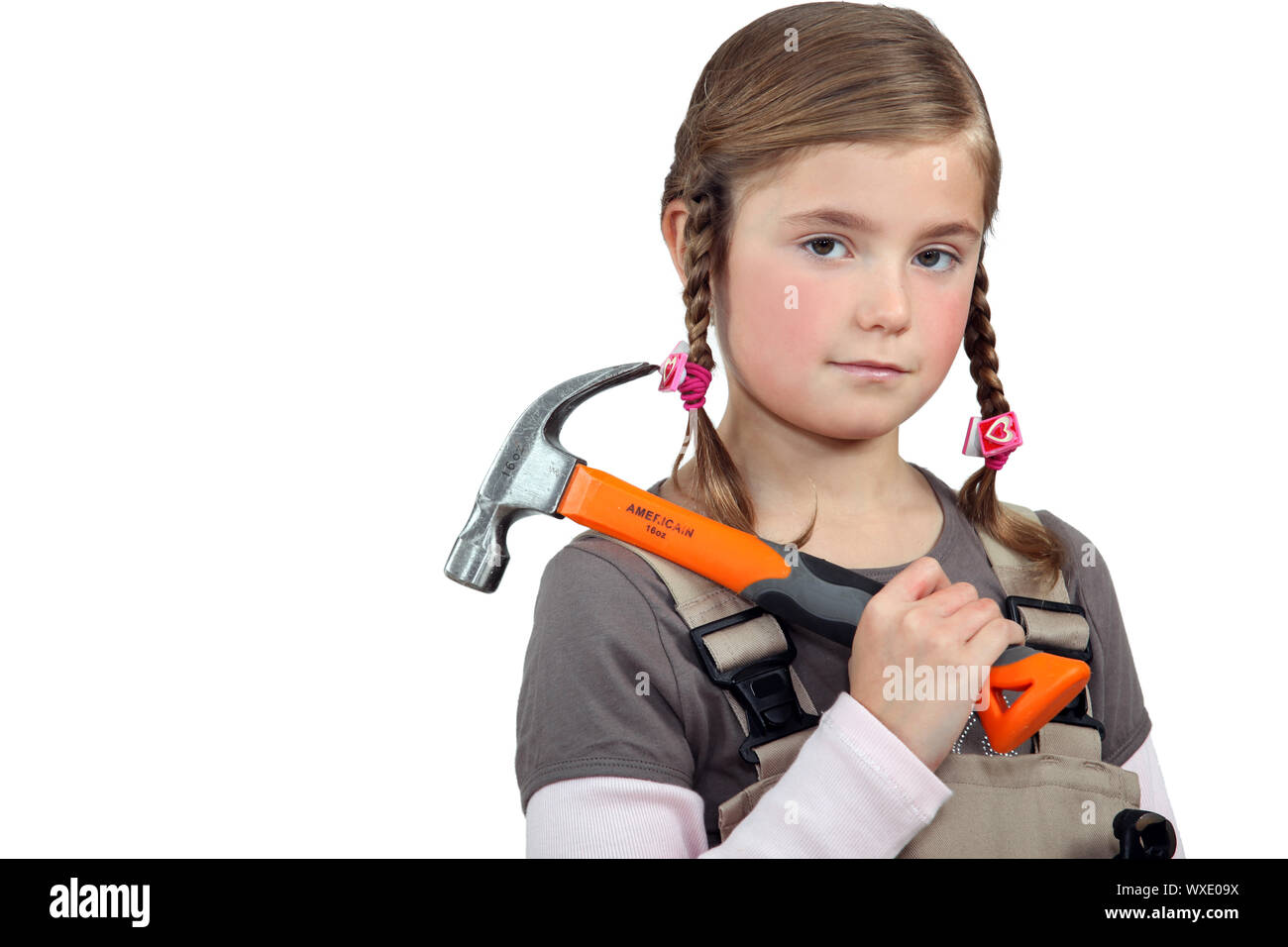 Little girl with hammer Stock Photo - Alamy