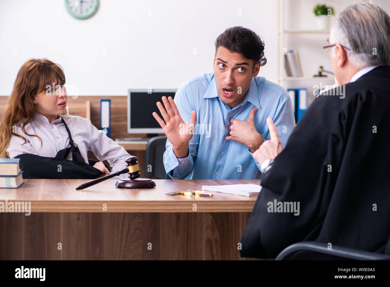 Young couple in the courthouse in divorce concept Stock Photo - Alamy