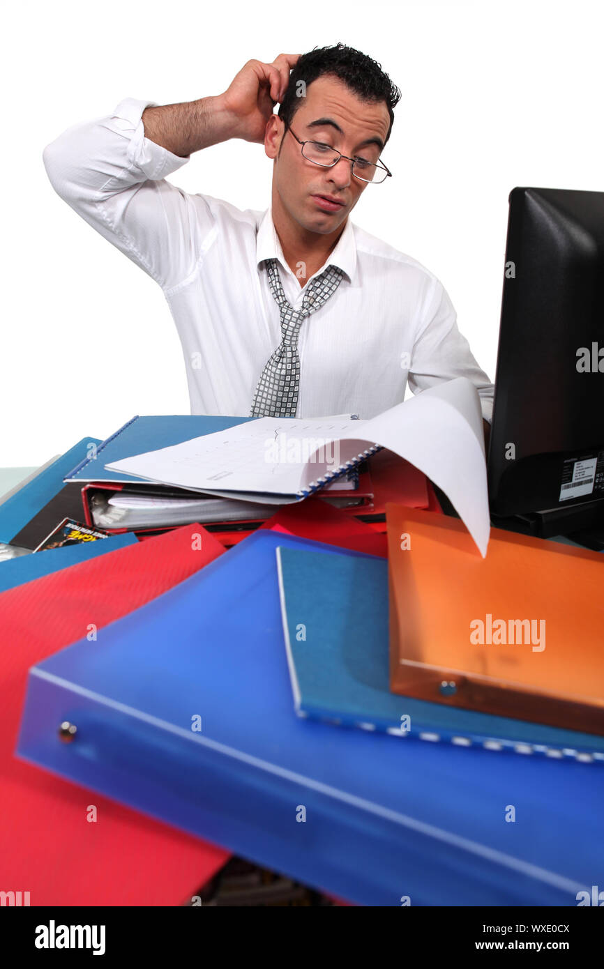 Swamped by paperwork hi-res stock photography and images - Alamy