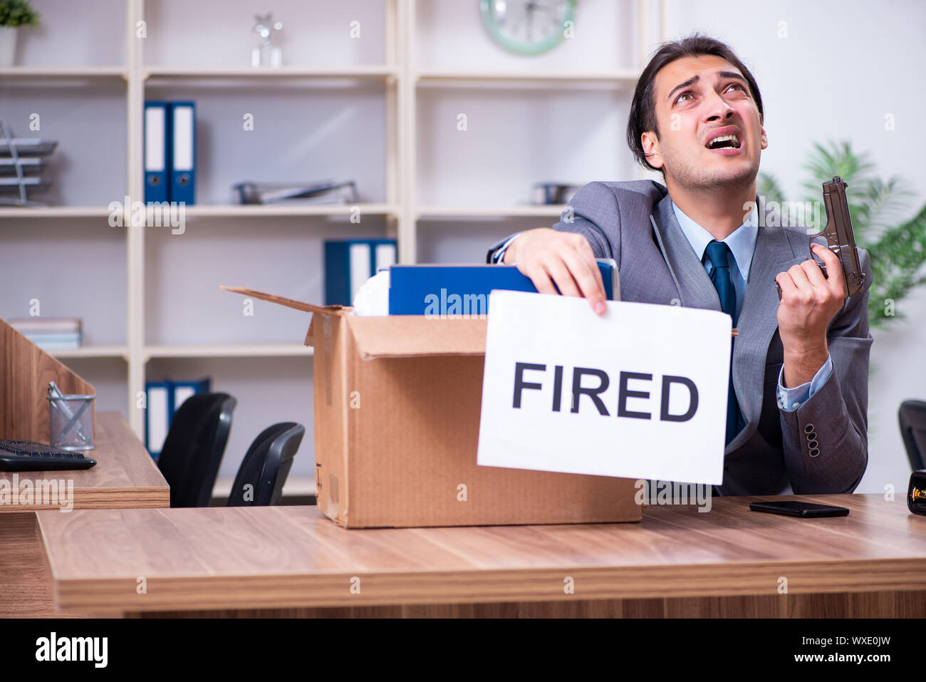 Boss firing dismissing employee hi-res stock photography and images - Alamy