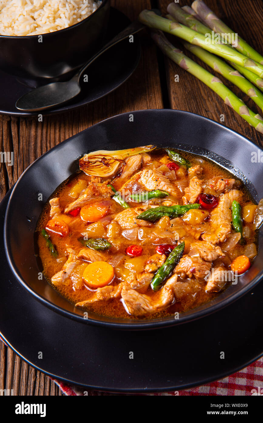 colorful turkey fricassee with asparagus and paprika Stock Photo - Alamy