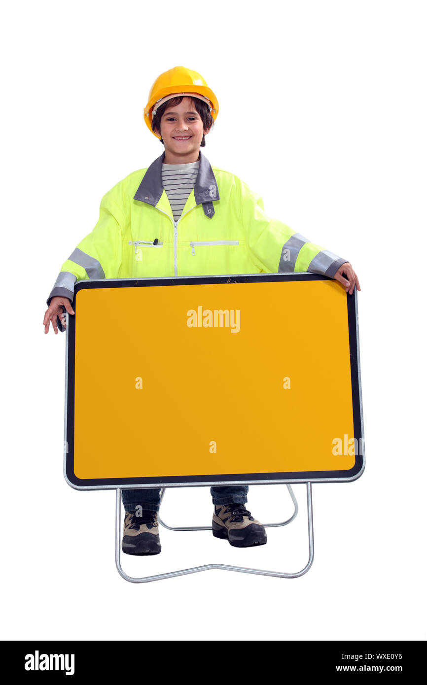 Young boy dressed as a construction worker Stock Photo - Alamy