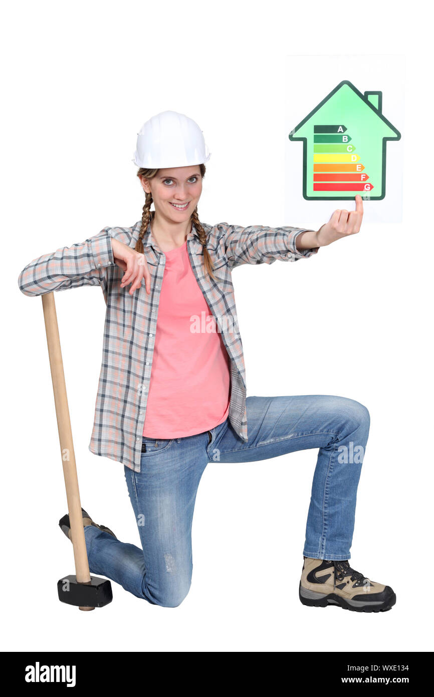 Tradeswoman holding up rating chart Stock Photo - Alamy