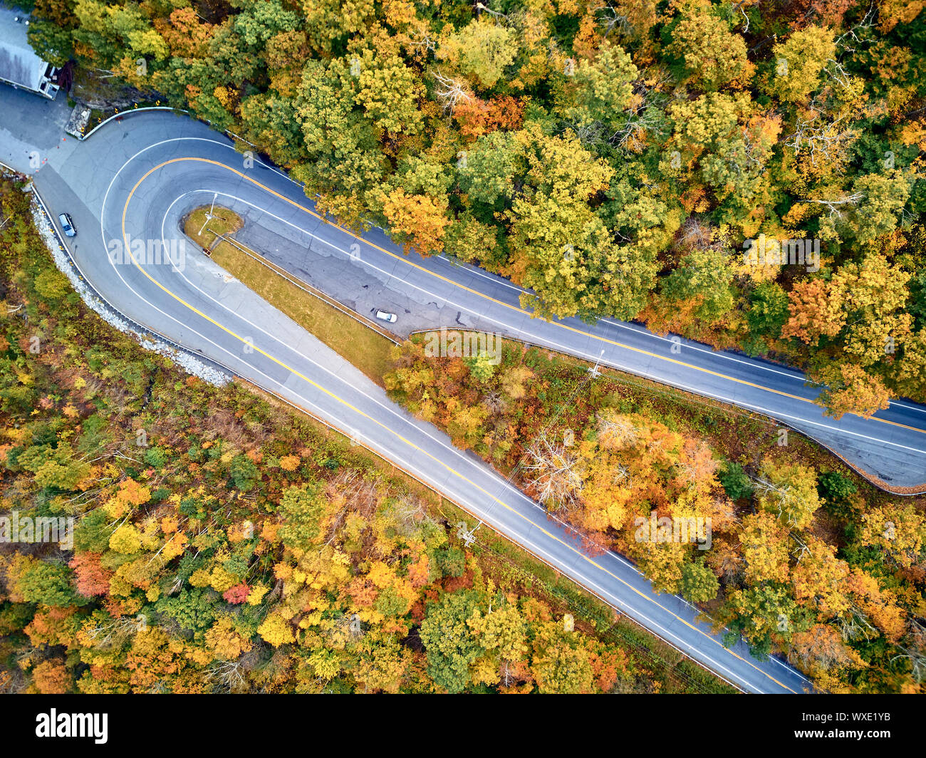 Scenic highway hairpin turn in autumn Stock Photo - Alamy