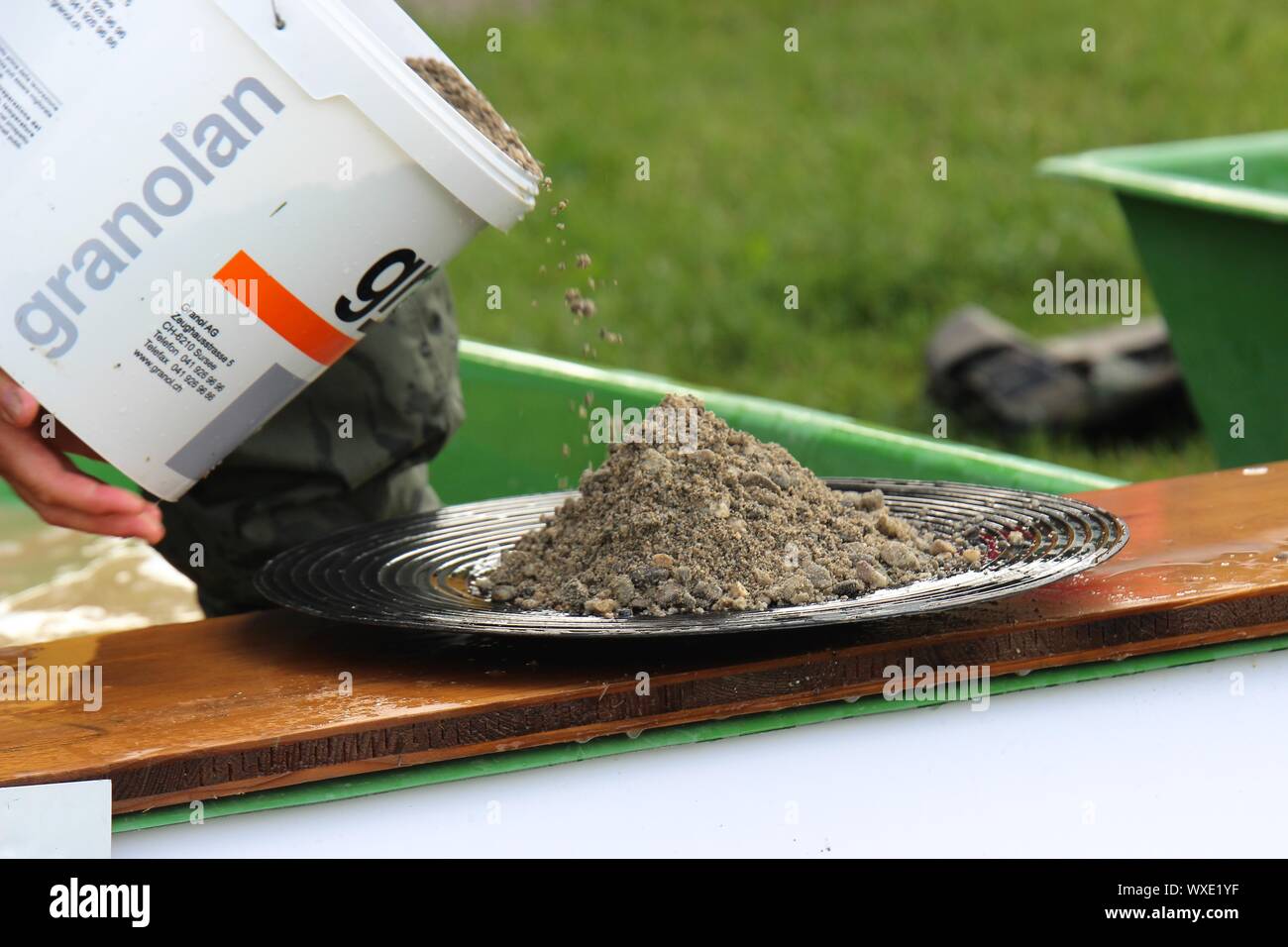 A gold panner pans for gold in a competition in Switzerland Stock Photo ...