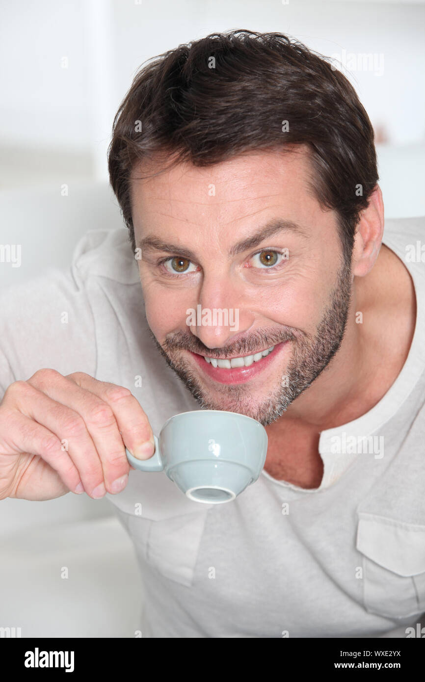 Man drinking coffee Stock Photo - Alamy