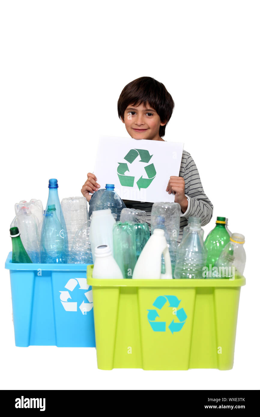 Little boy recycling Stock Photo - Alamy