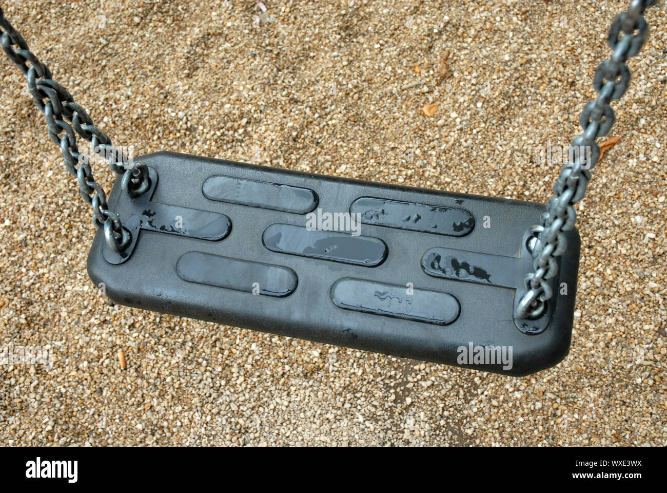 Upper view of an empty swing set Stock Photo - Alamy