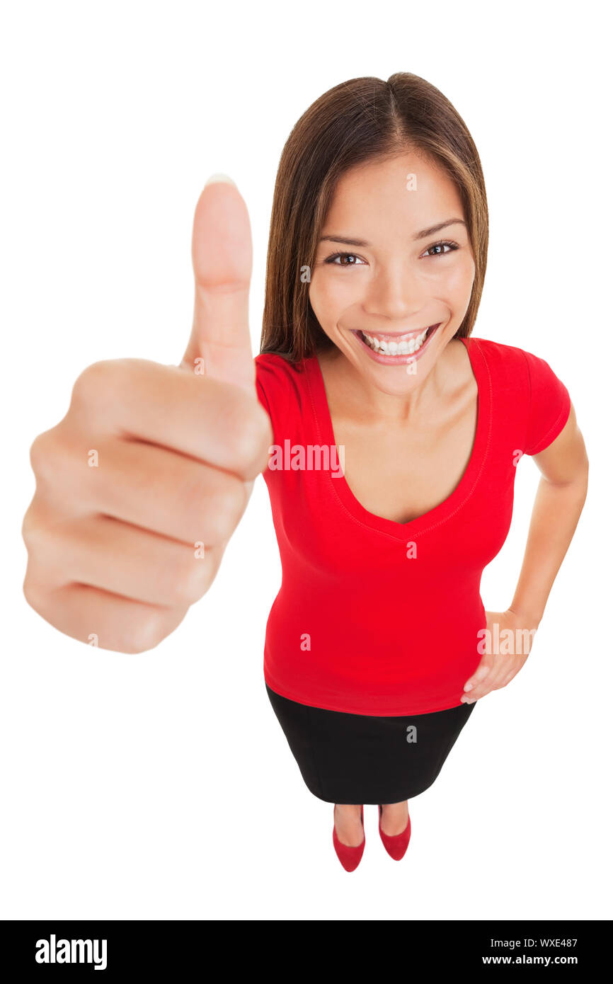 Thumbs up woman. Fun high angle full body portrait of a vivacious ...