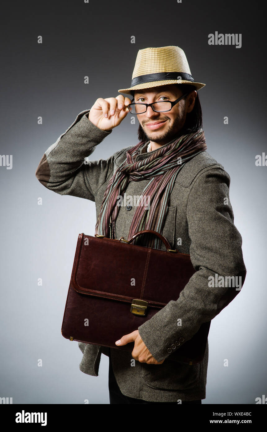 Man wearing vintage hat in funny concept Stock Photo - Alamy