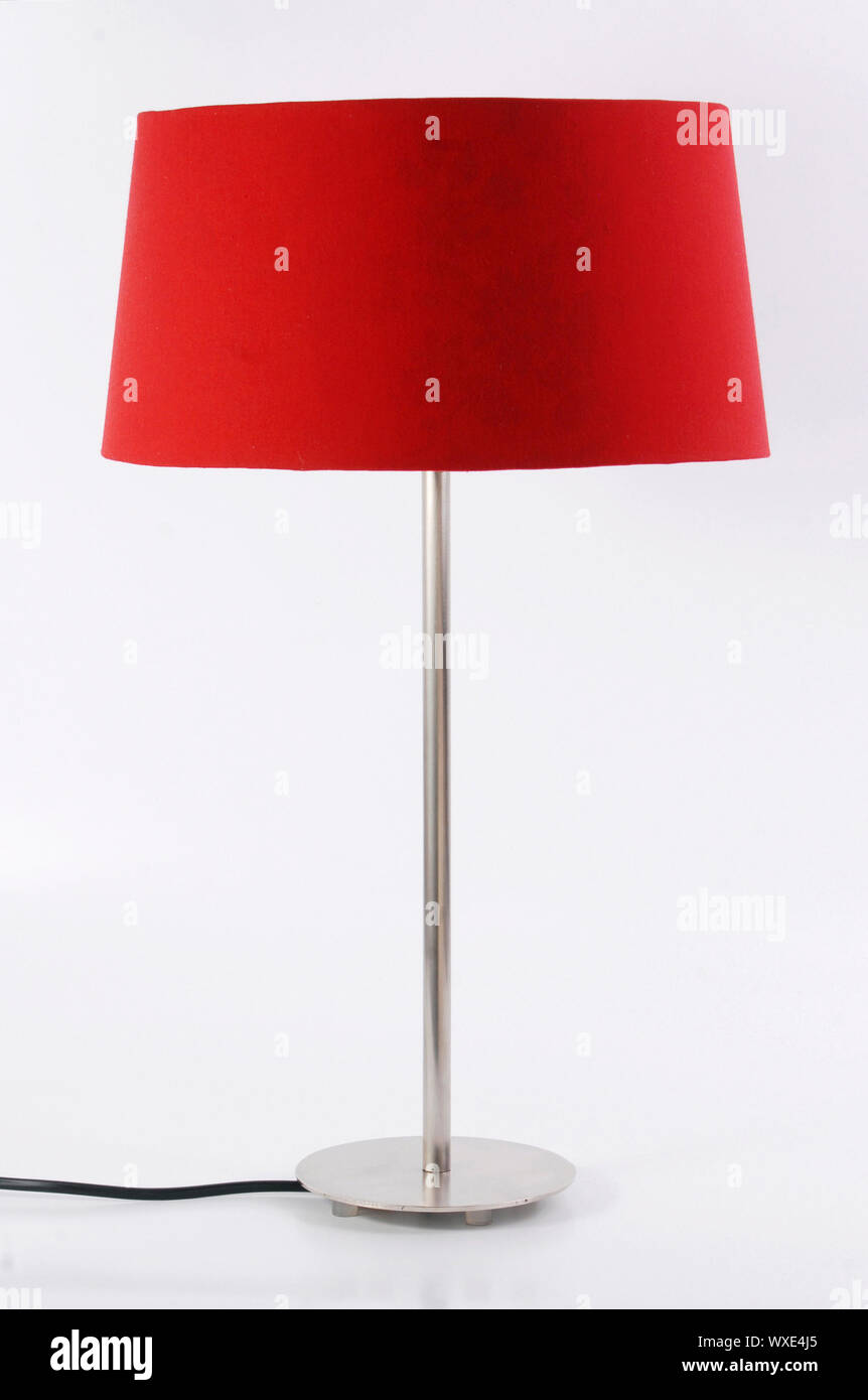 Contemporary metallic and red floor lamp isolated on white background ...