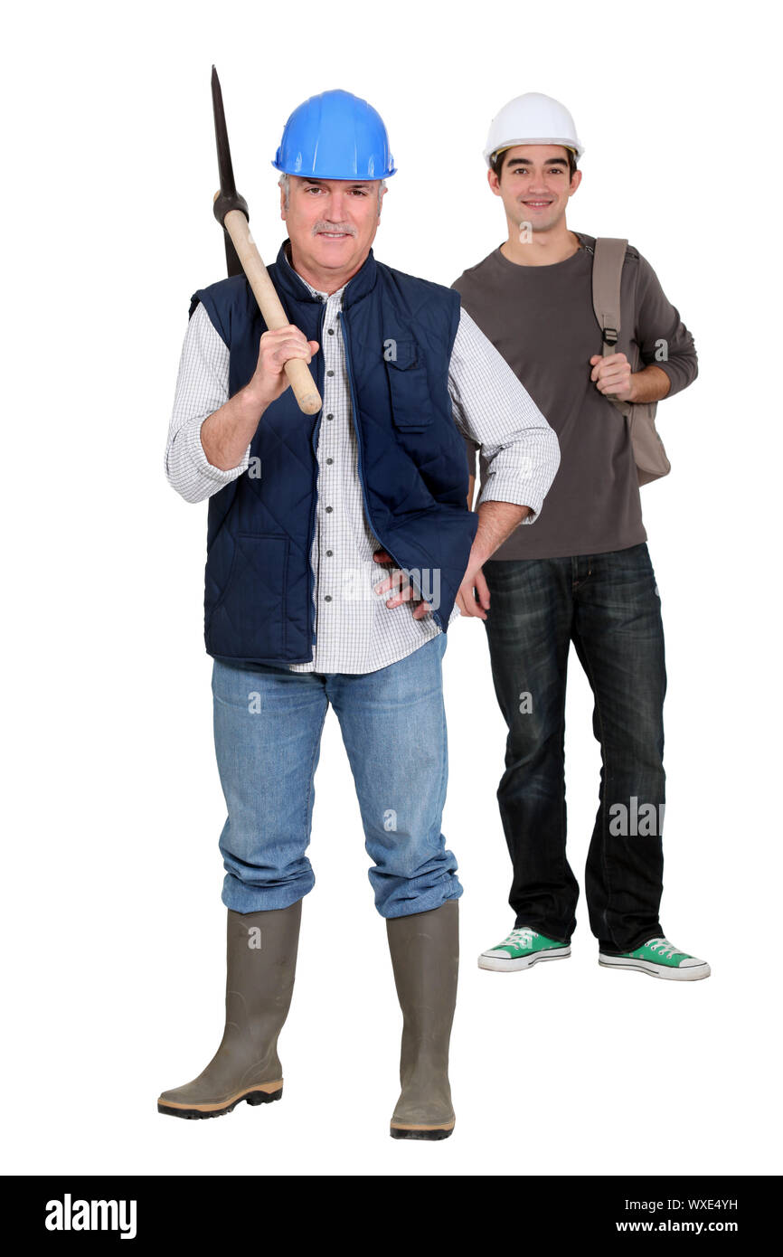 Two workers with axe Stock Photo - Alamy