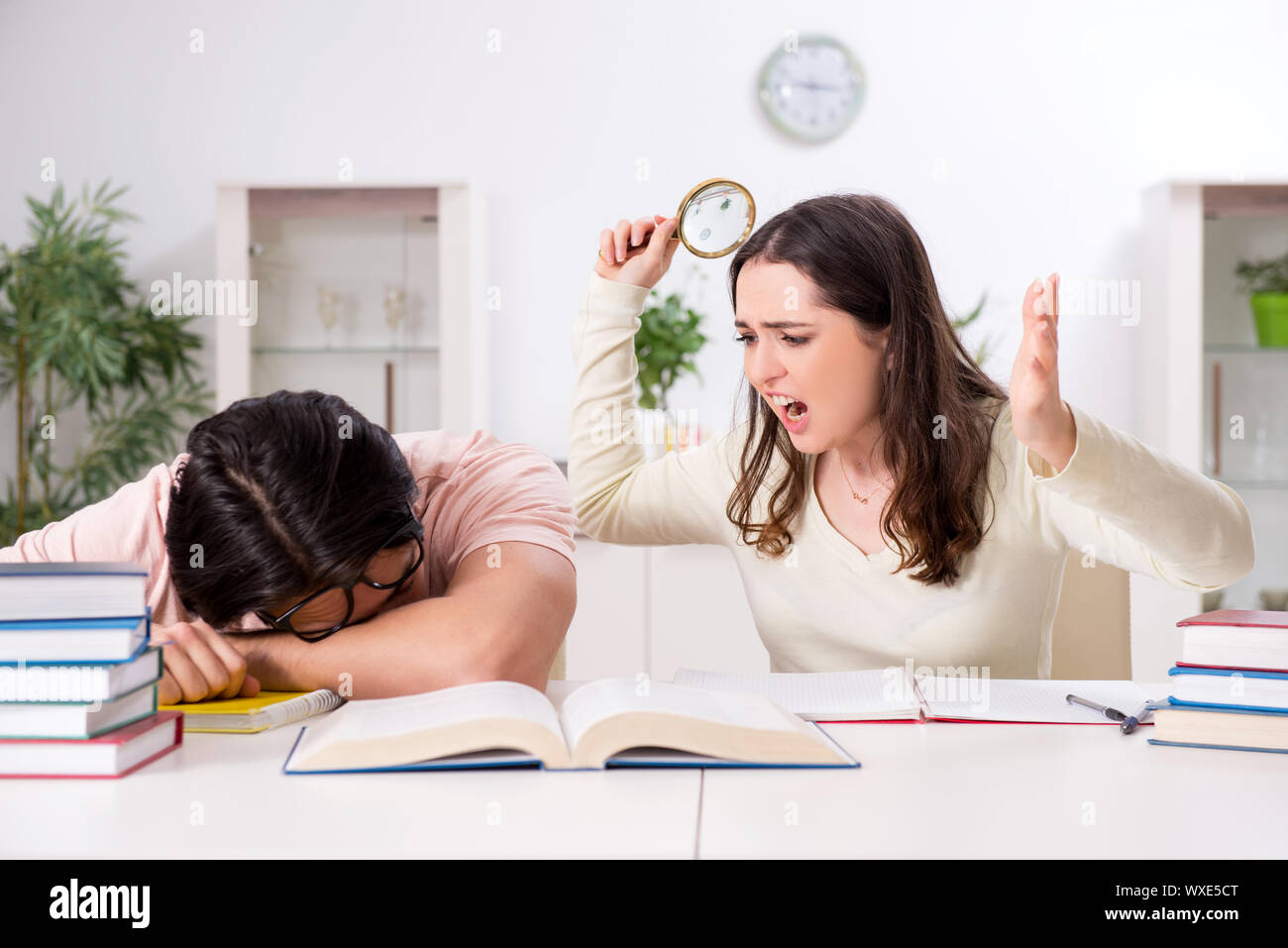 Students preparing for exam together at home Stock Photo - Alamy