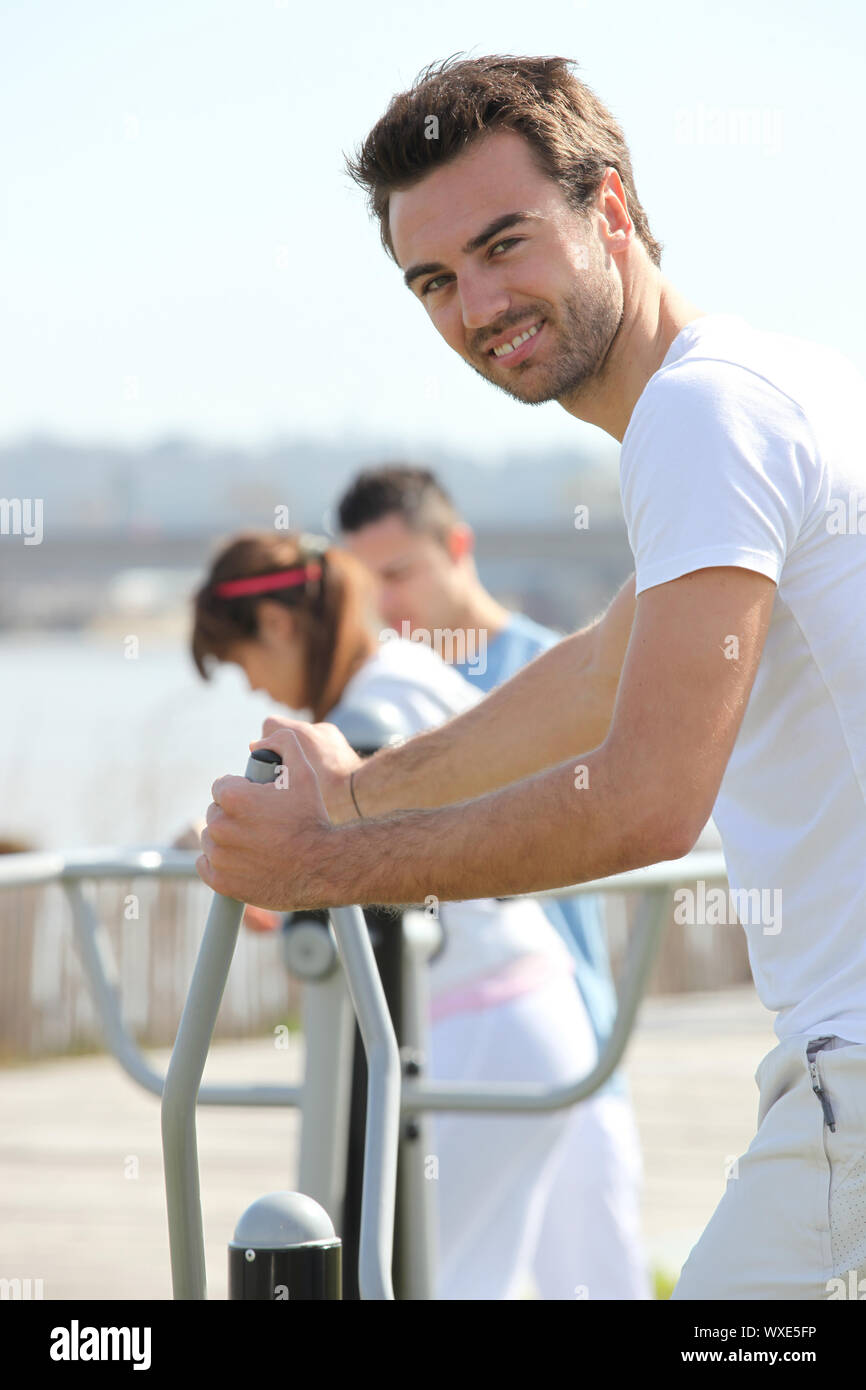 Man doing gymnastics in urban space Stock Photo - Alamy