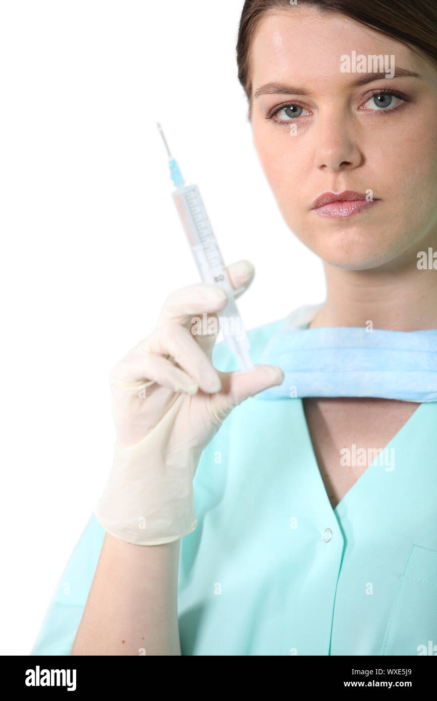 Nurse with needle Stock Photo - Alamy