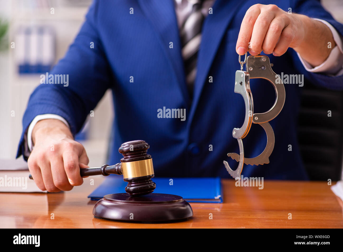 Man court hand cuffs hi-res stock photography and images - Alamy